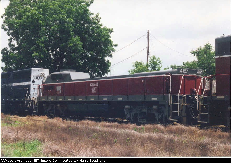 GSWR 4167 works with GP38-3 mother and a ex-NS GP40 in Columbus, GA. This GE built slug got a ...